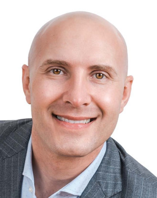 Learn the History of The Greenspan Co./Adjusters International | The ...